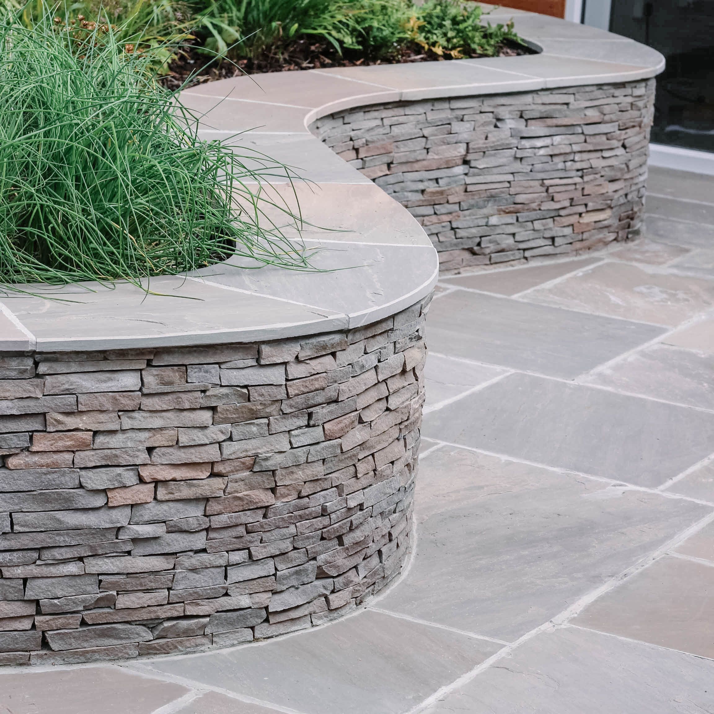 12+ Creative stone wall ideas for patios and gardens